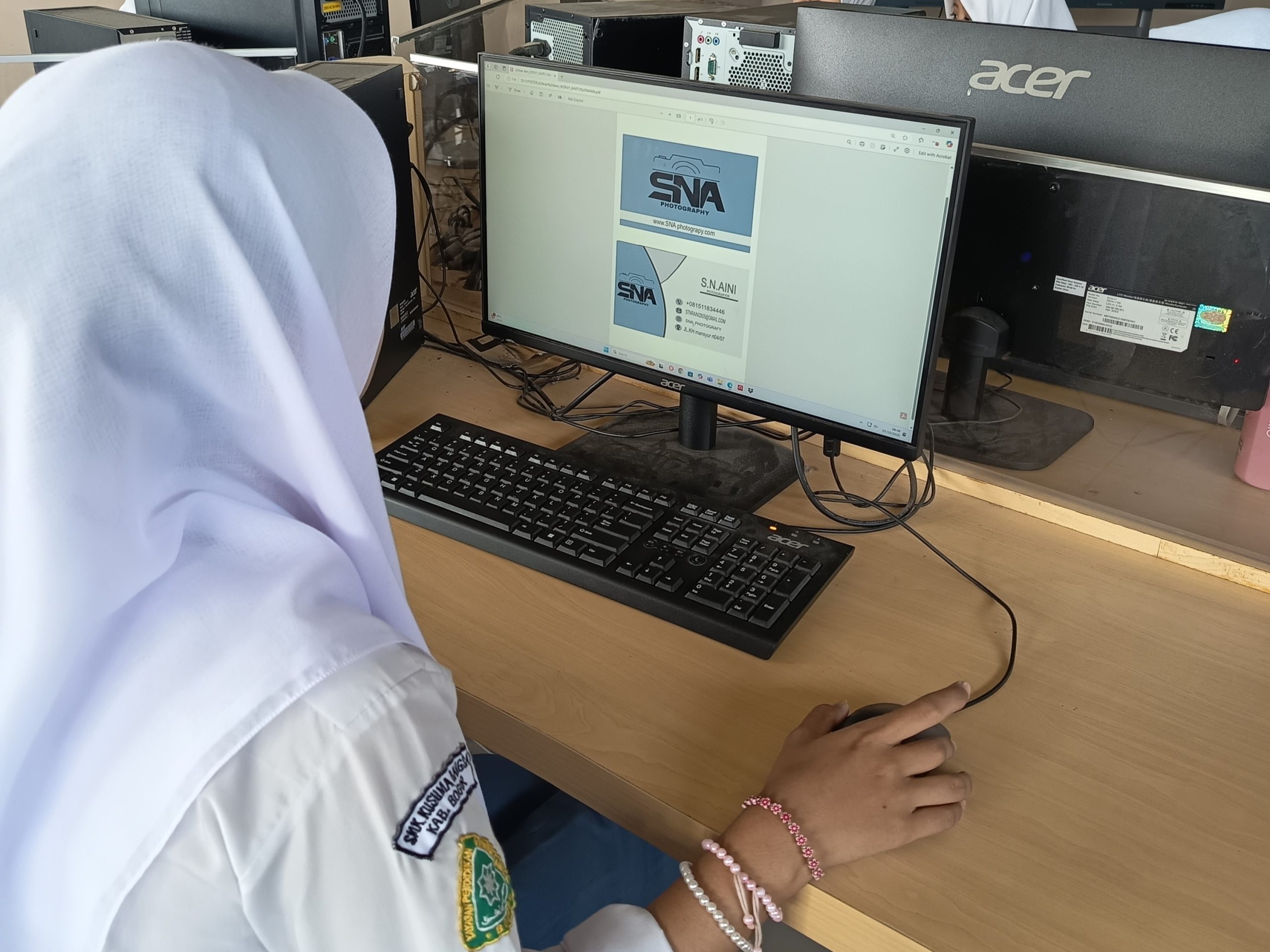 Makna Desain Logo SNA Photography Karya Siti Noer Aeni - SMK Kusuma ...
